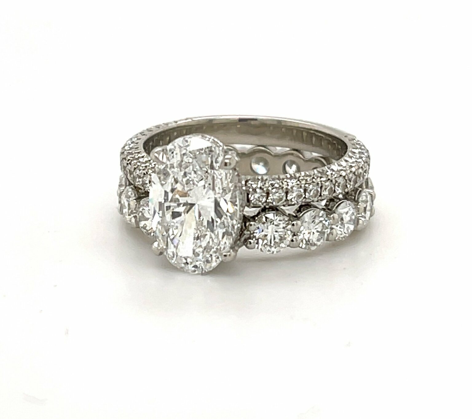 Oval Engagement Ring with Three-Sided Diamond Band Los Angeles Peter Norman