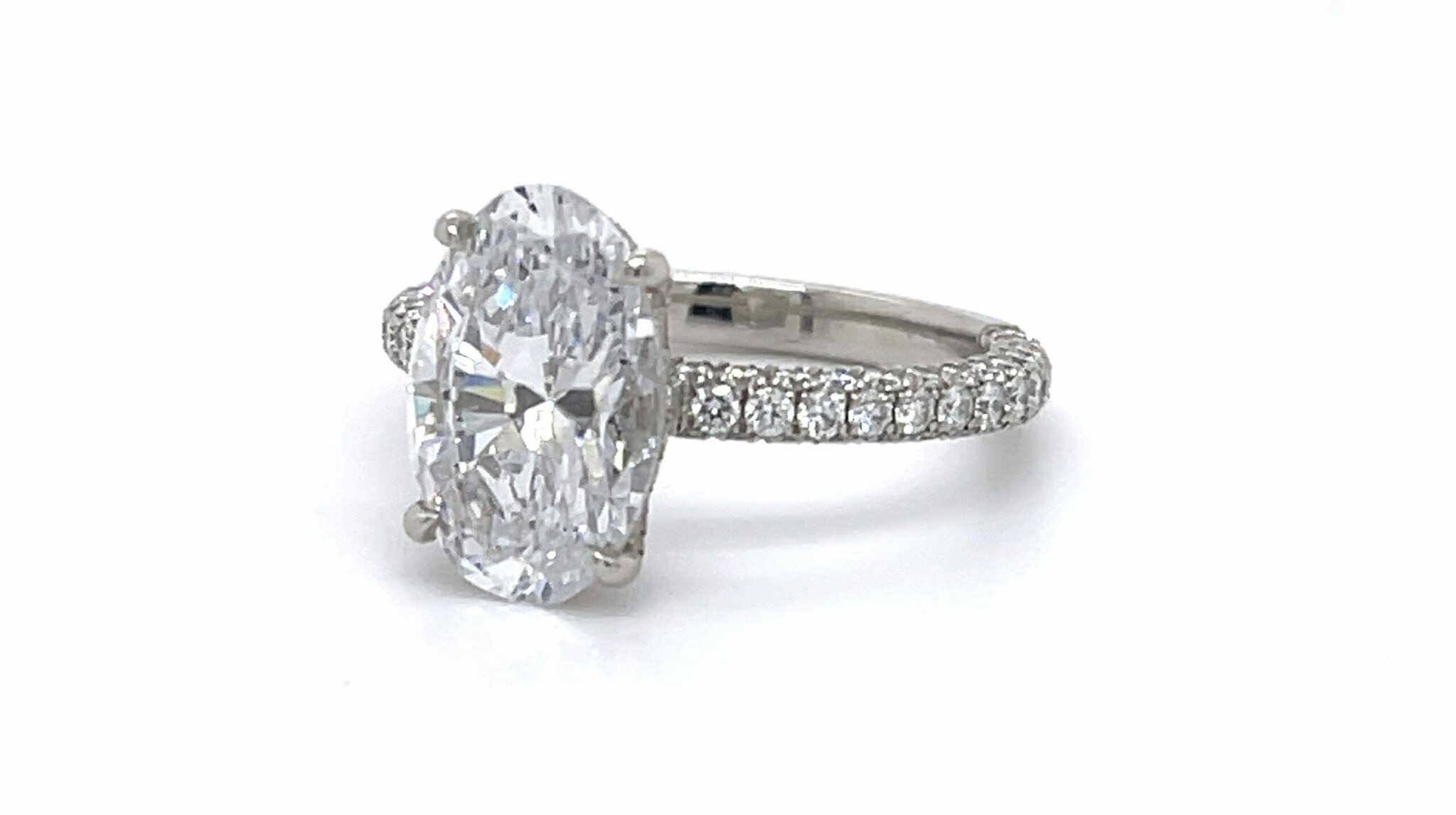 Oval Engagement Ring with Three-Sided Diamond Band Los Angeles Peter Norman