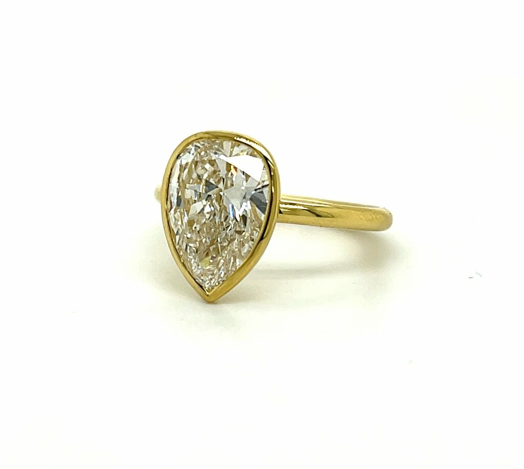 Bezel-Set Pear-Shaped Diamond Engagement Ring Los Angeles | Peter Norman