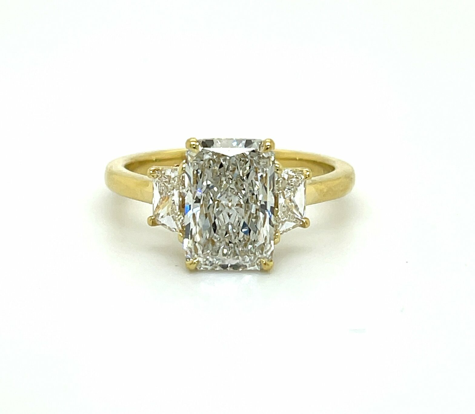 Three-Stone Radiant-Cut and Trapezoid Engagement Ring Los Angeles ...