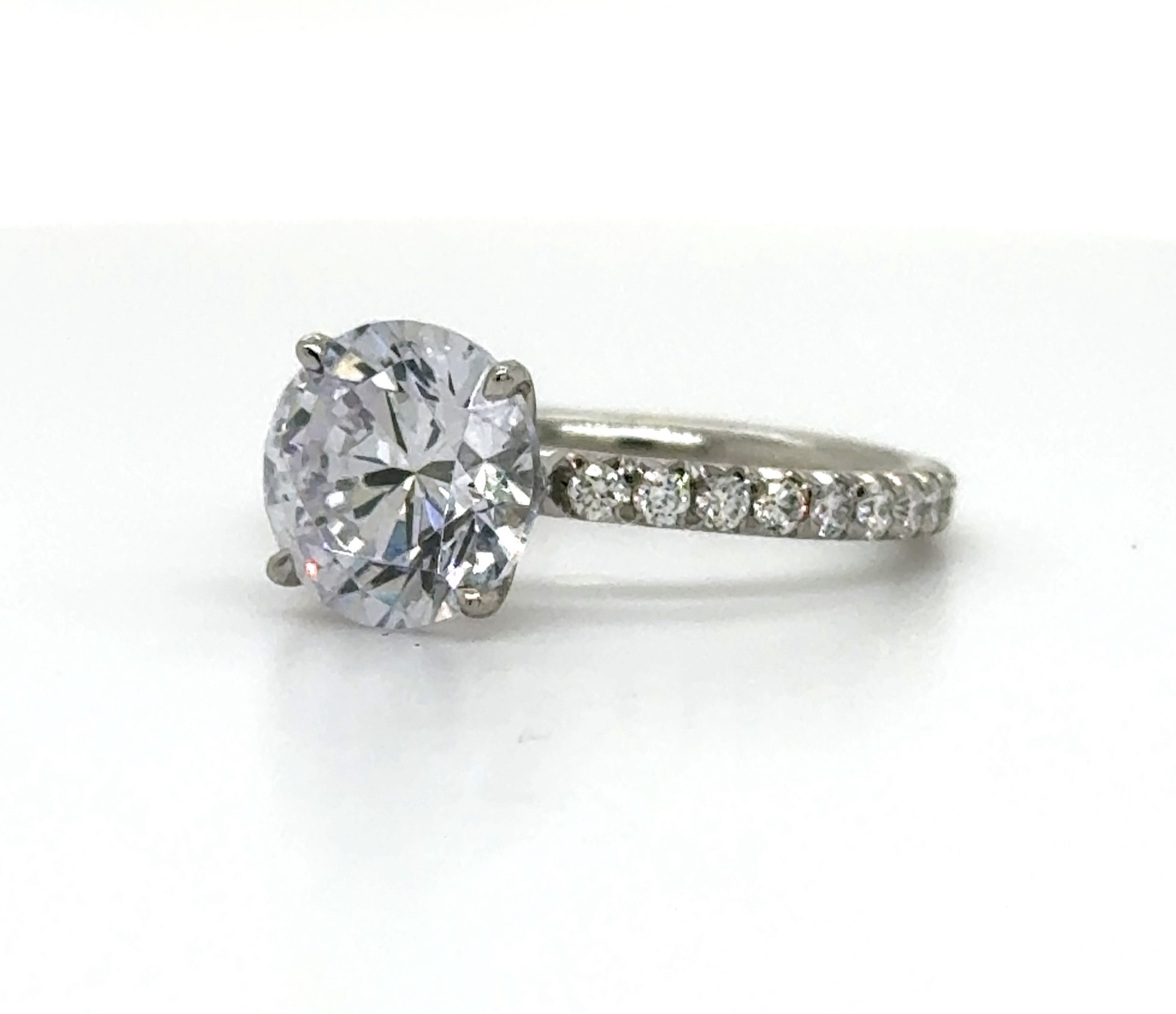 Round Brilliant-Cut Engagement Ring with Diamond Floral Prongs | Peter ...