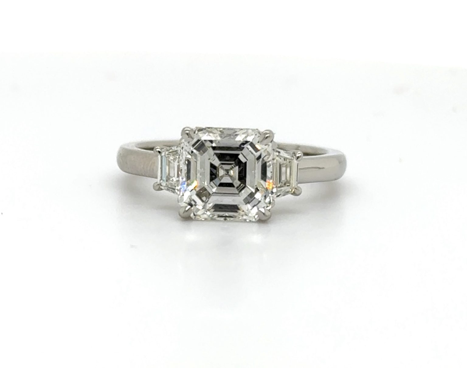 Asscher-Cut Diamond Ring with Trapezoid Side Stones | Peter Norman