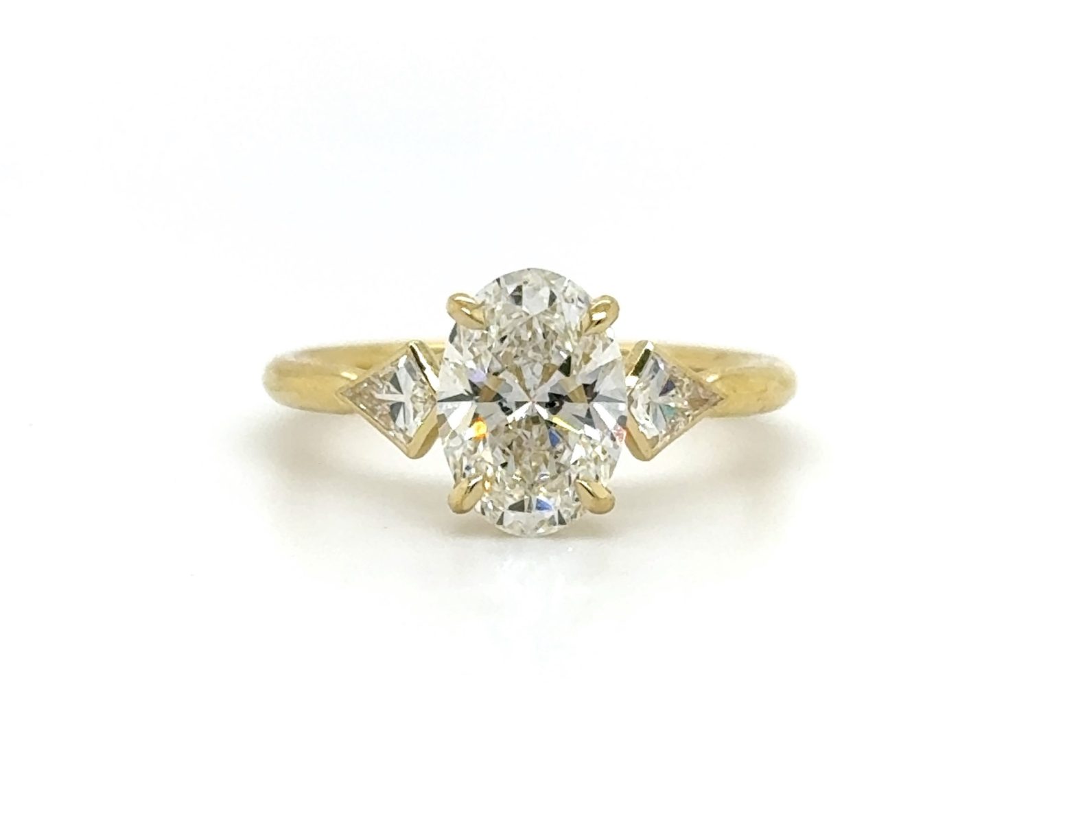 Oval-Cut Diamond Engagement Ring with Bezel-Set Kites Peter Norman