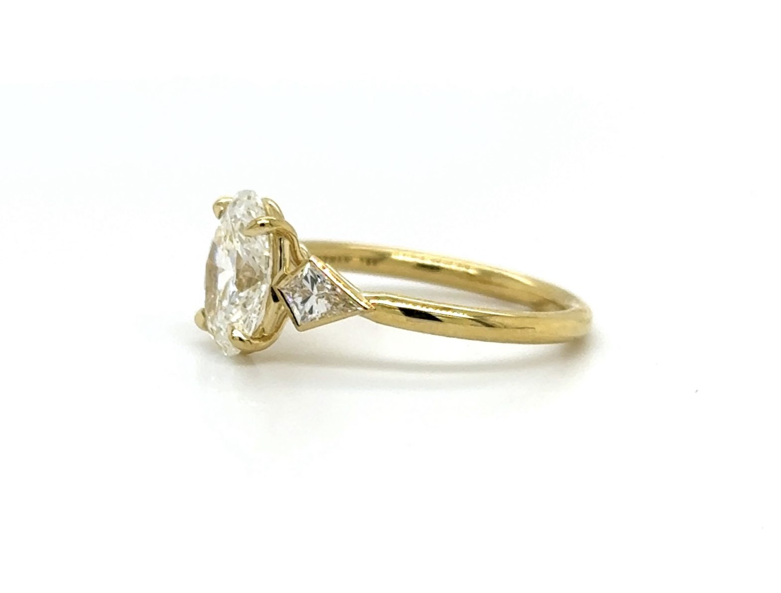Oval-Cut Diamond Engagement Ring with Bezel-Set Kites Peter Norman