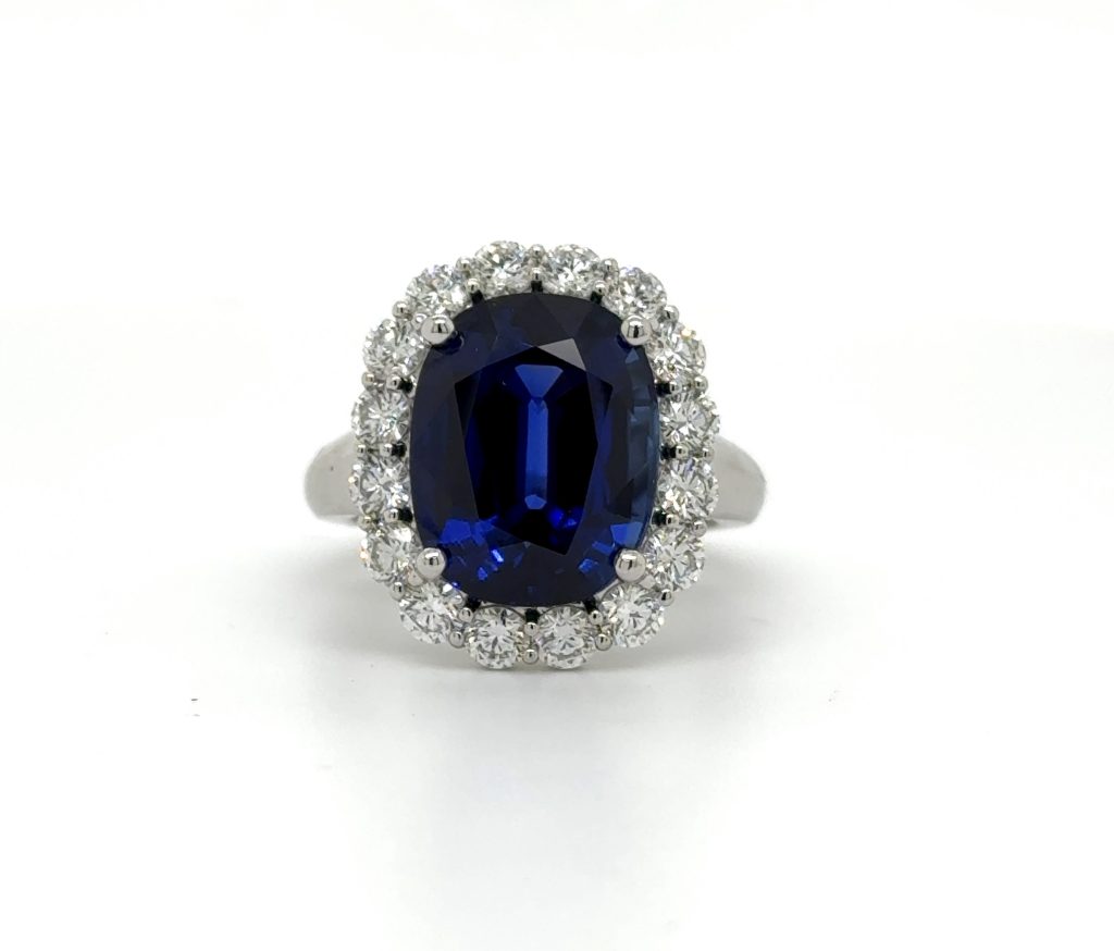 Oval Sapphire Ring with Diamond Halo | Peter Norman