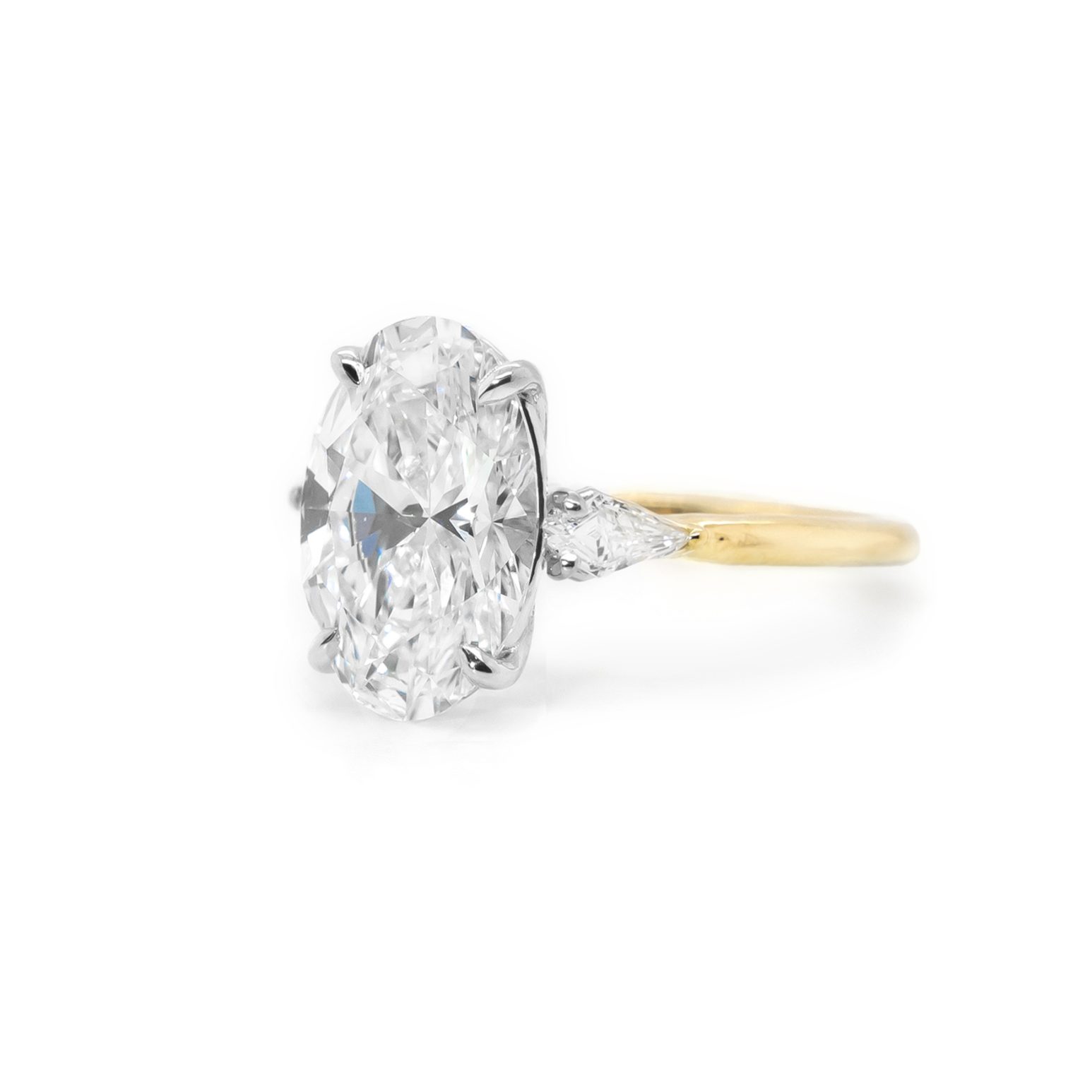 Three-Stone Engagement Ring with Oval and Kite Diamonds Peter Norman