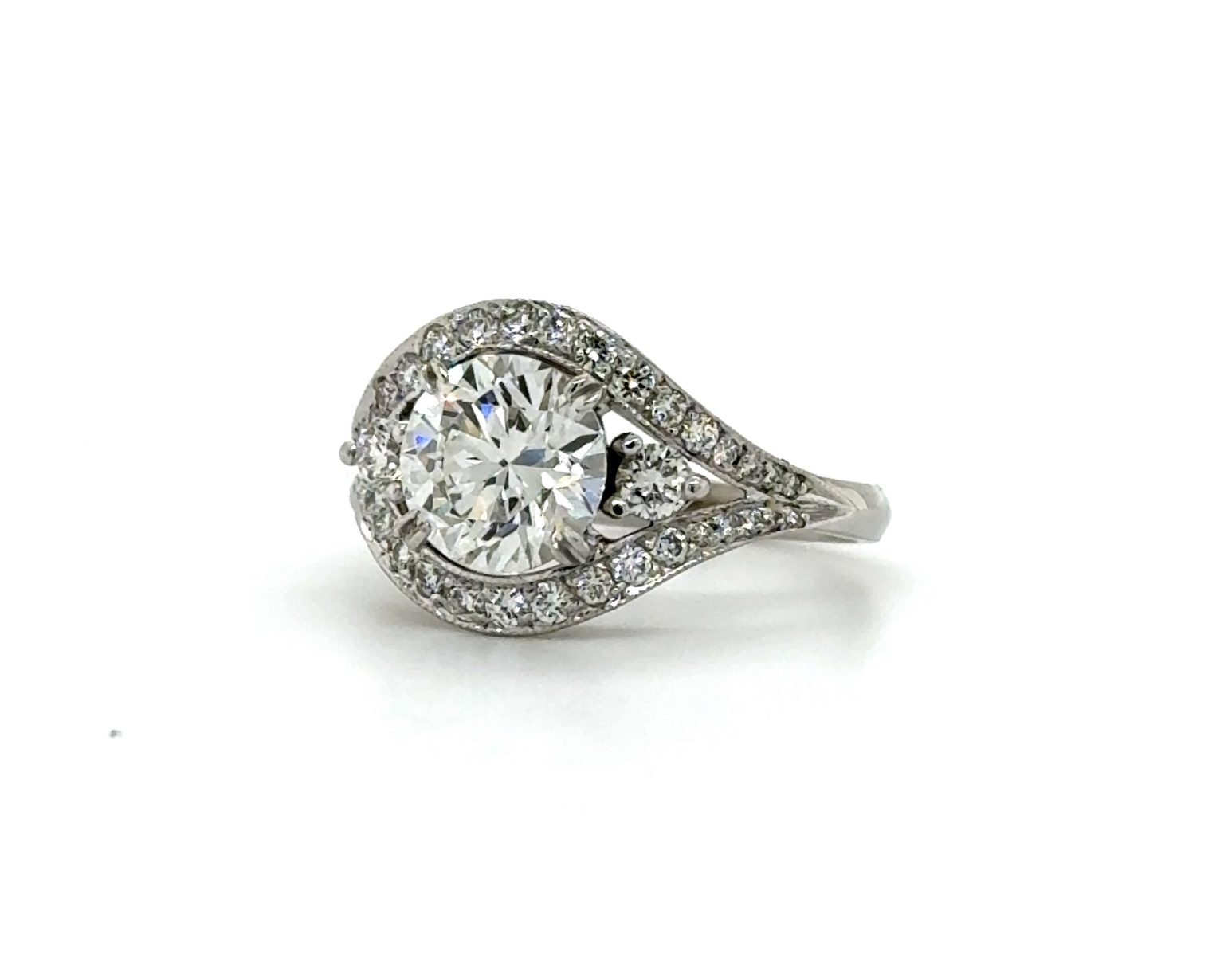 Triple Round Diamond Ring with an Open Frame Peter Norman