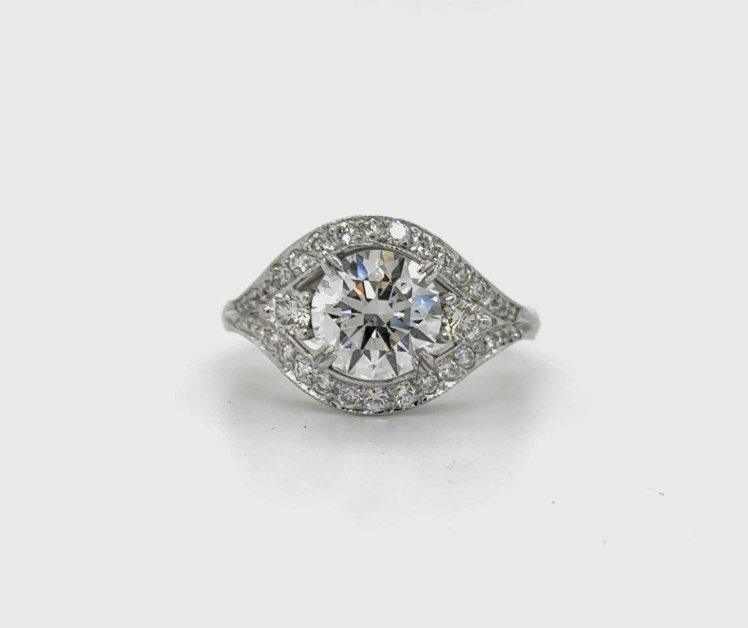 Triple Round Diamond Ring with an Open Frame Peter Norman
