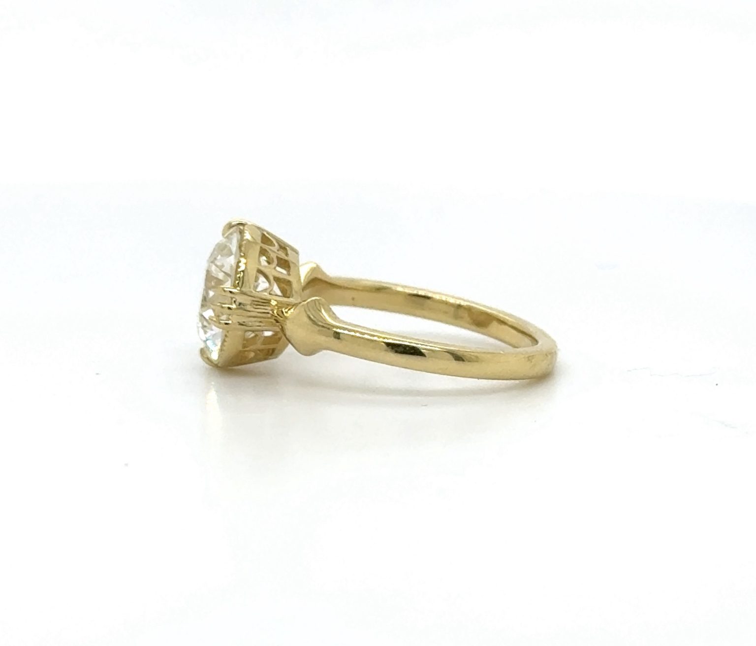 Multi-Prong Engagement Ring in Yellow Gold Peter Norman