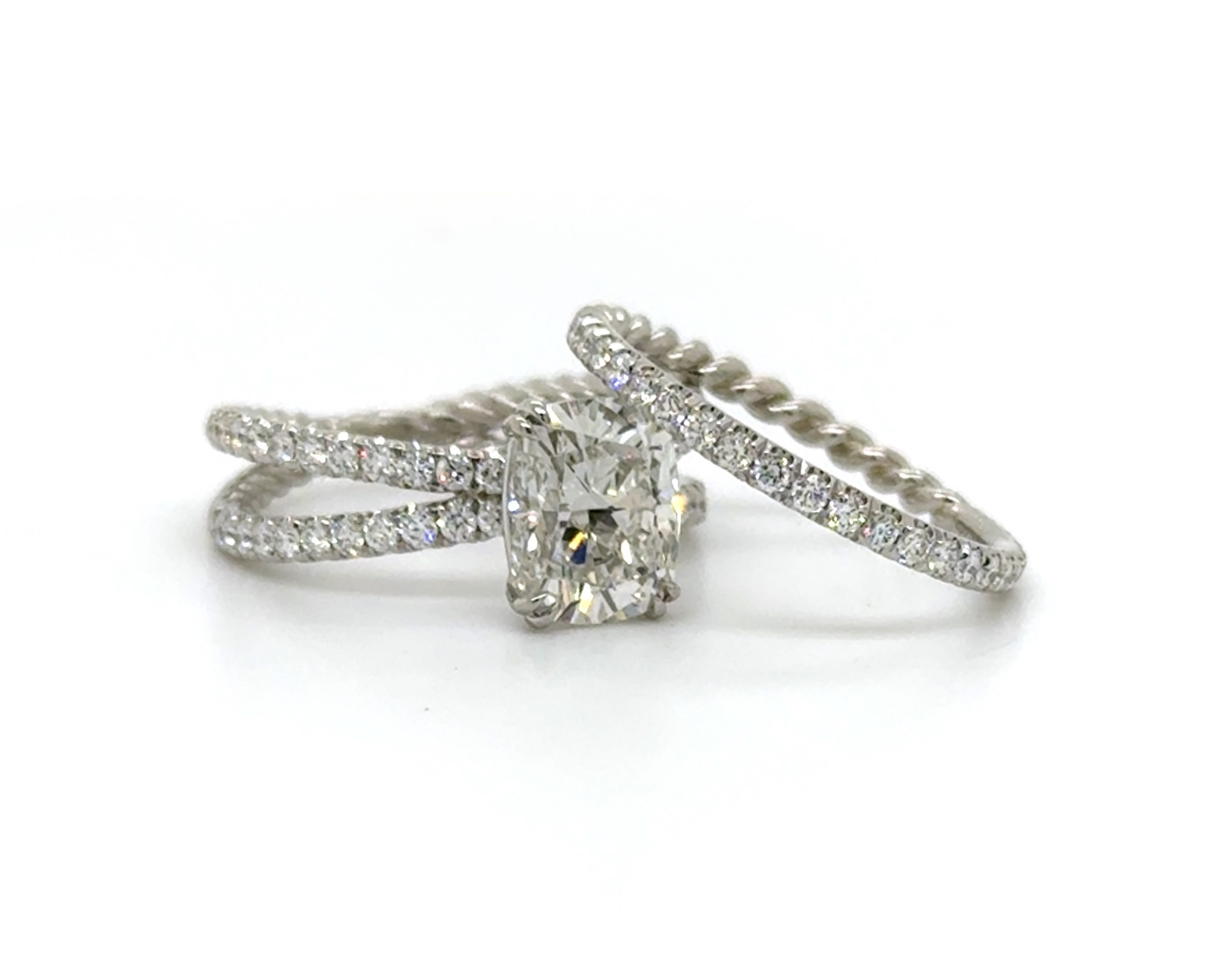 Cushion-Cut Diamond Ring with an X-Shaped Band Peter Norman
