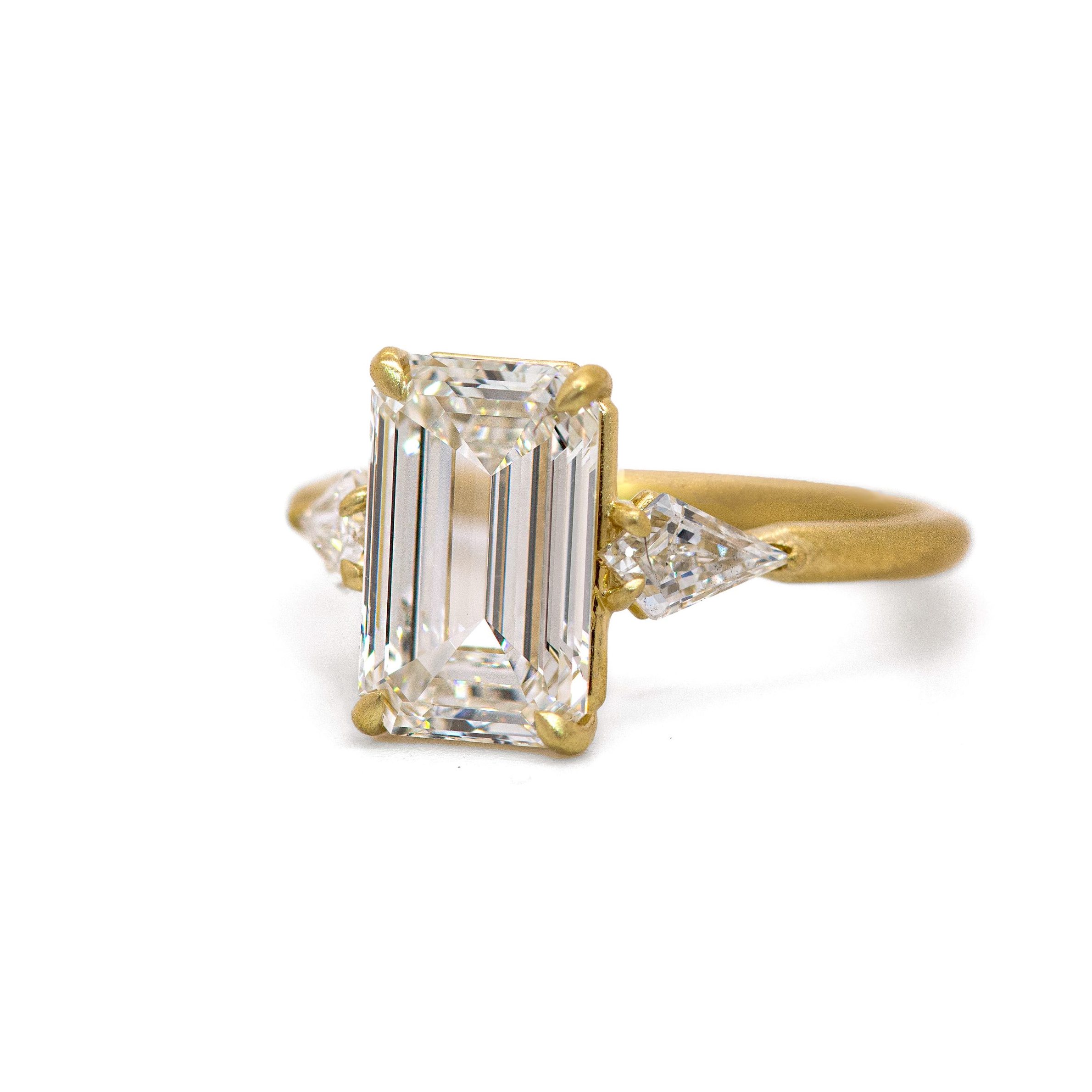 Emerald Engagement Ring with Kites in a Satin Finish Peter Norman